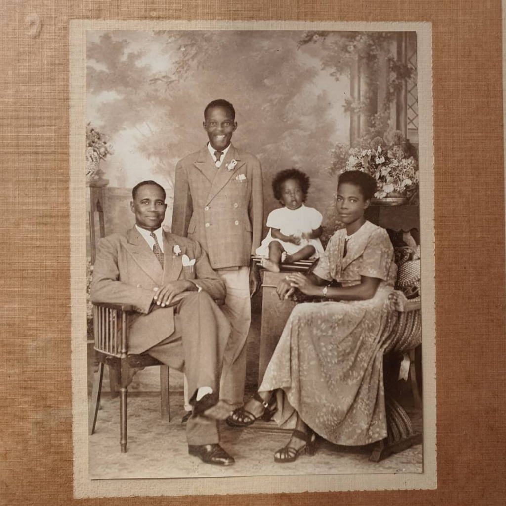 Baby Simon with Mum, Dad and Uncle (standing) | Mustapha B Mugisa. Mr ...